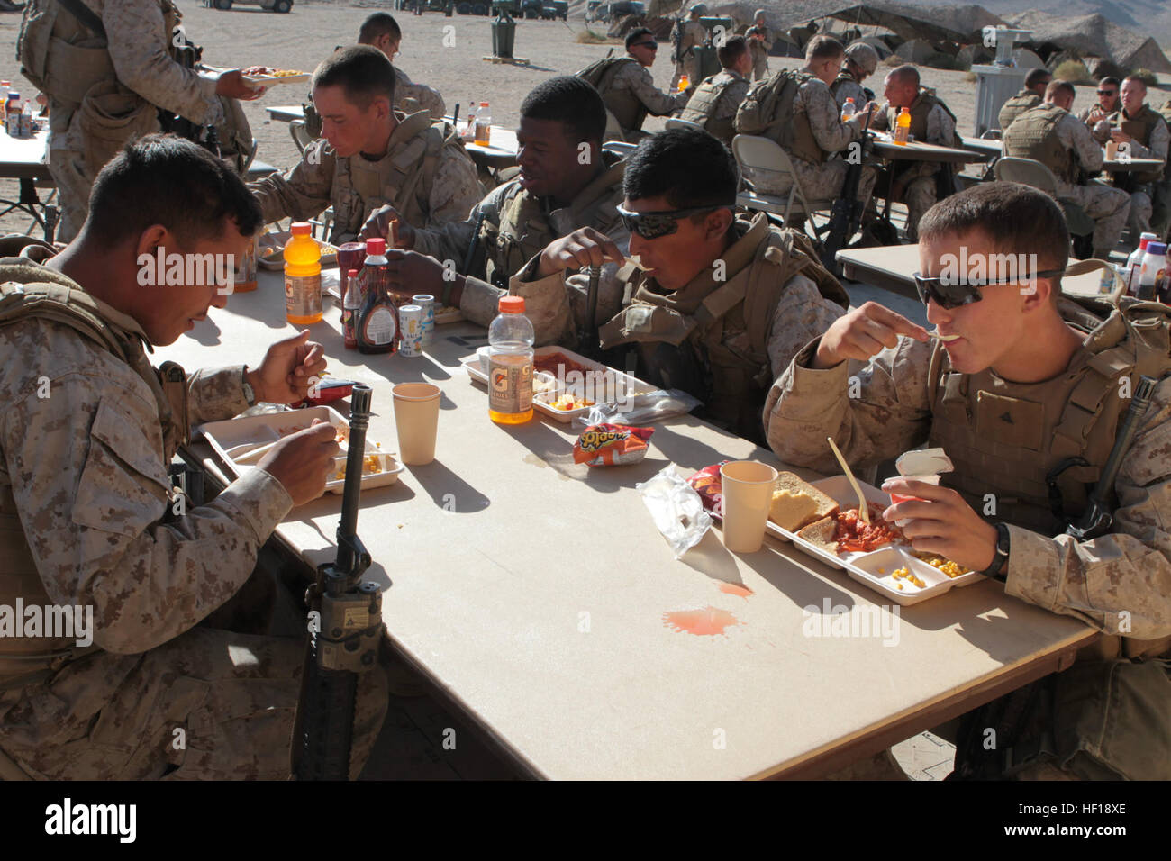 Marines participating in Exercise Desert Scimitar, enjoy a hearty meal ...