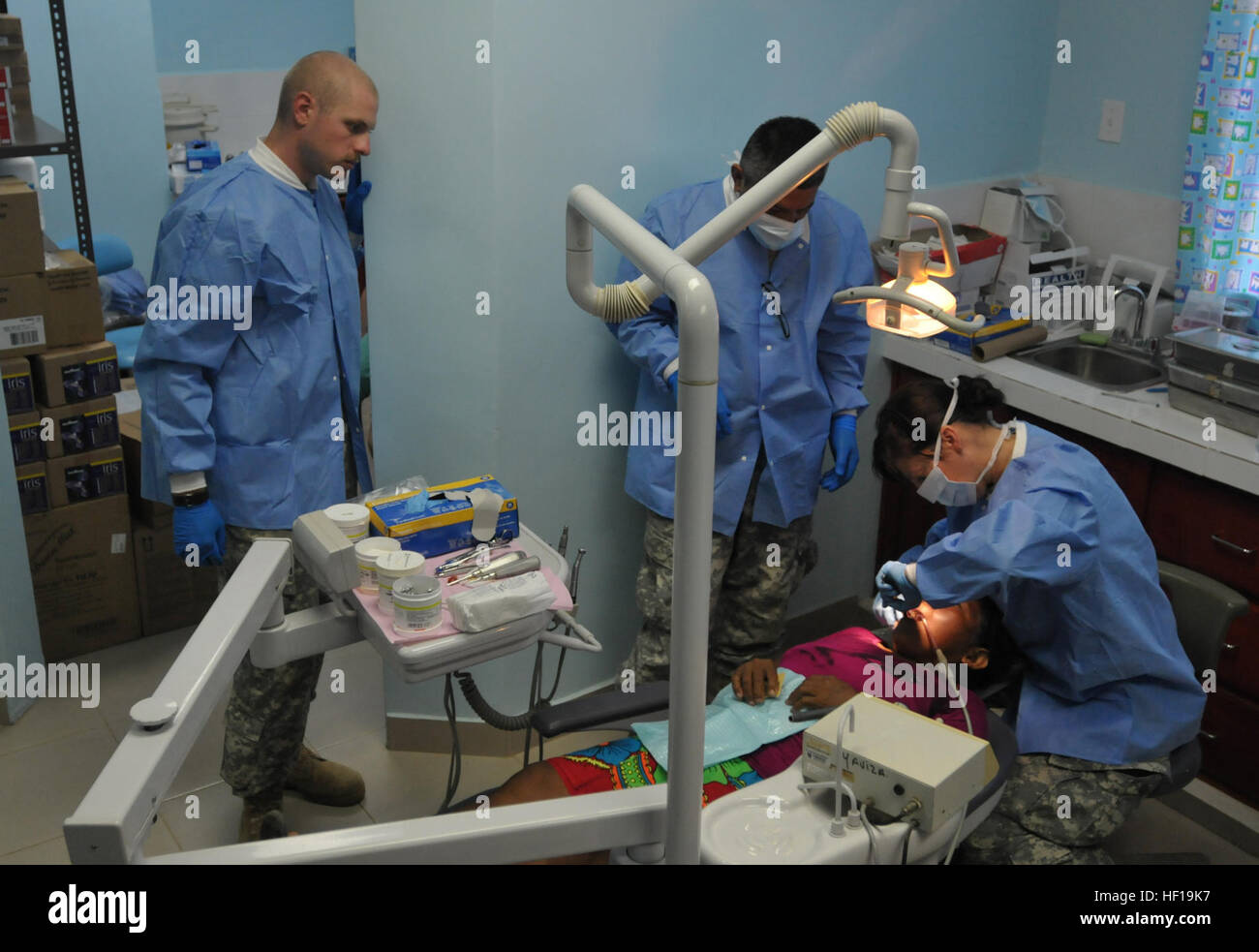 U.S. Army Spc. Kevin Fields (left), a medic with 441st Ground Ambulance ...