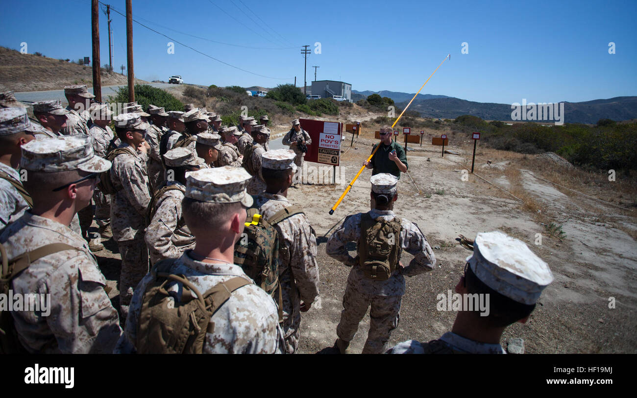 A Marine Corps Engineering School instructor demonstrates the Holley ...