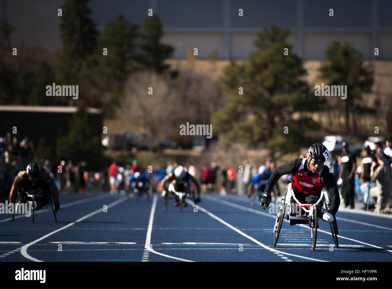 Sgt. Anthony McDaniel crosses the finish line during the 100 meter ...