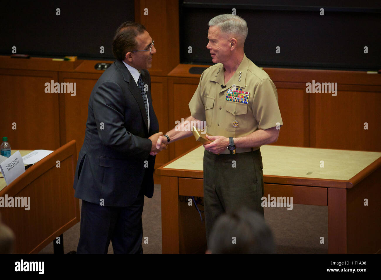 The 35th Commandant of the Marine Corps, Gen. James F. Amos, right ...