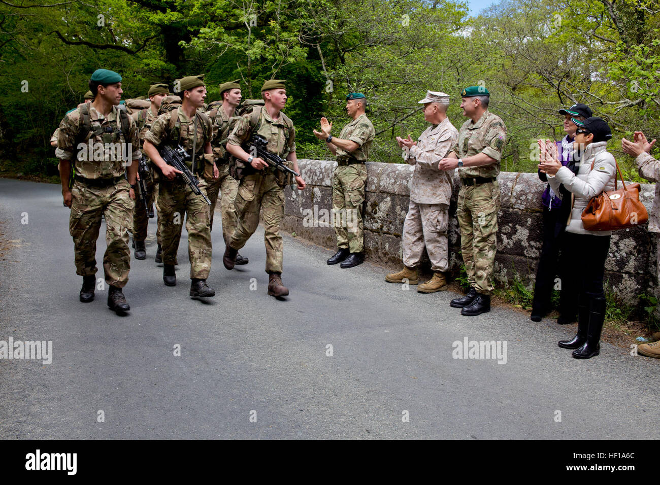The 35th Commandant of the Marine Corps, Gen. James F. Amos, center ...