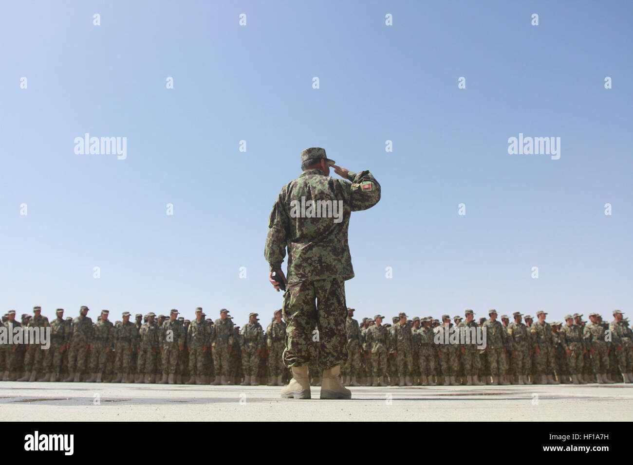 More than 500 Afghan National Army soldiers stand in formation during ...