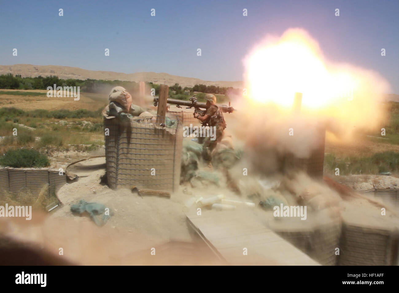 An Afghan National Army soldier fires a SPG-9, a Russian-made ...