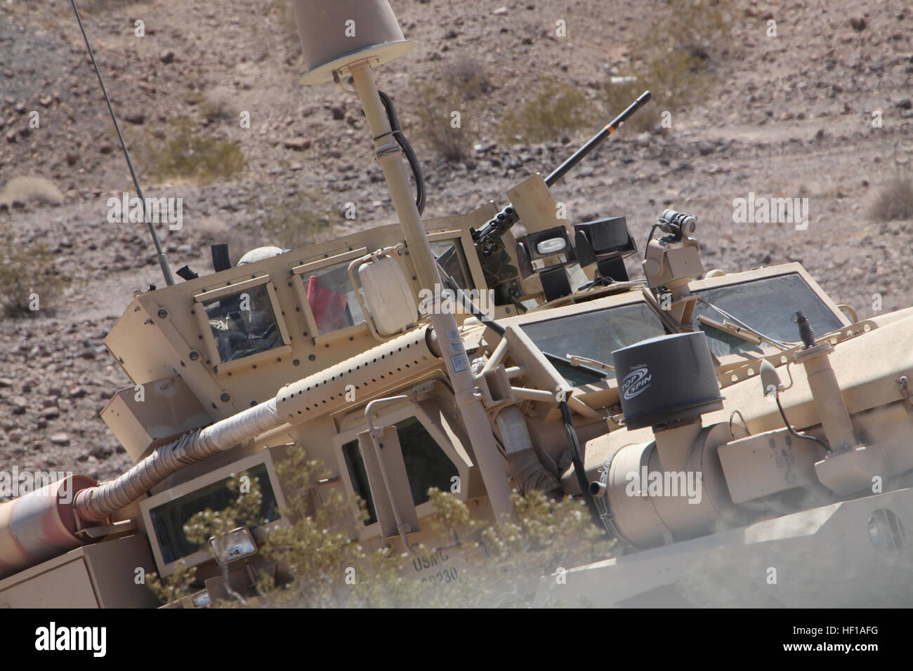 A Mine Resistant Ambush Protected Vehicle angles up a steep hill during ...