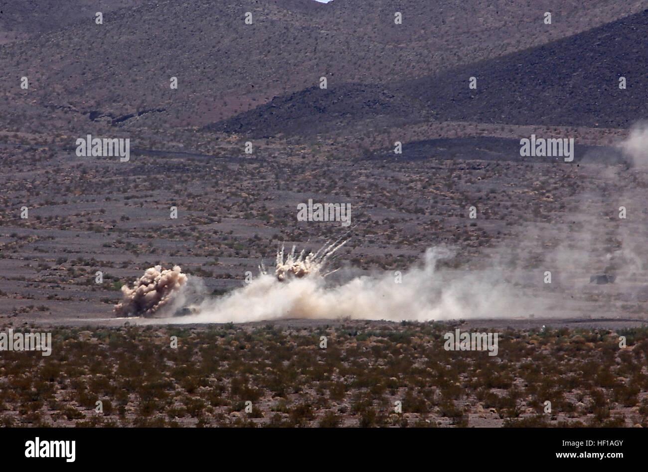 Hellfire missiles from Cobra gunships strike targets during a live-fire ...