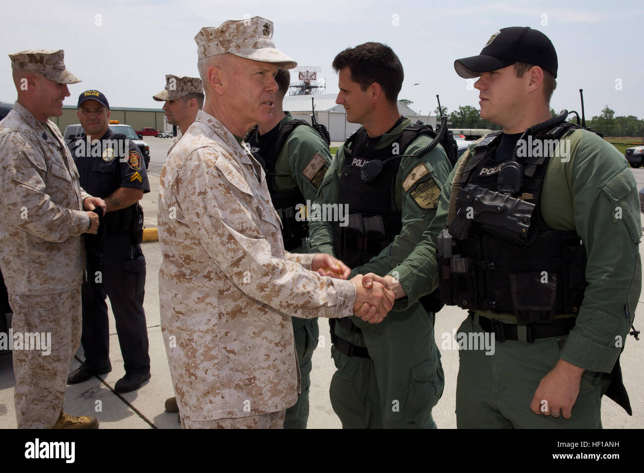 The 35th commandant of the Marine Corps, Gen. James F. Amos, center ...