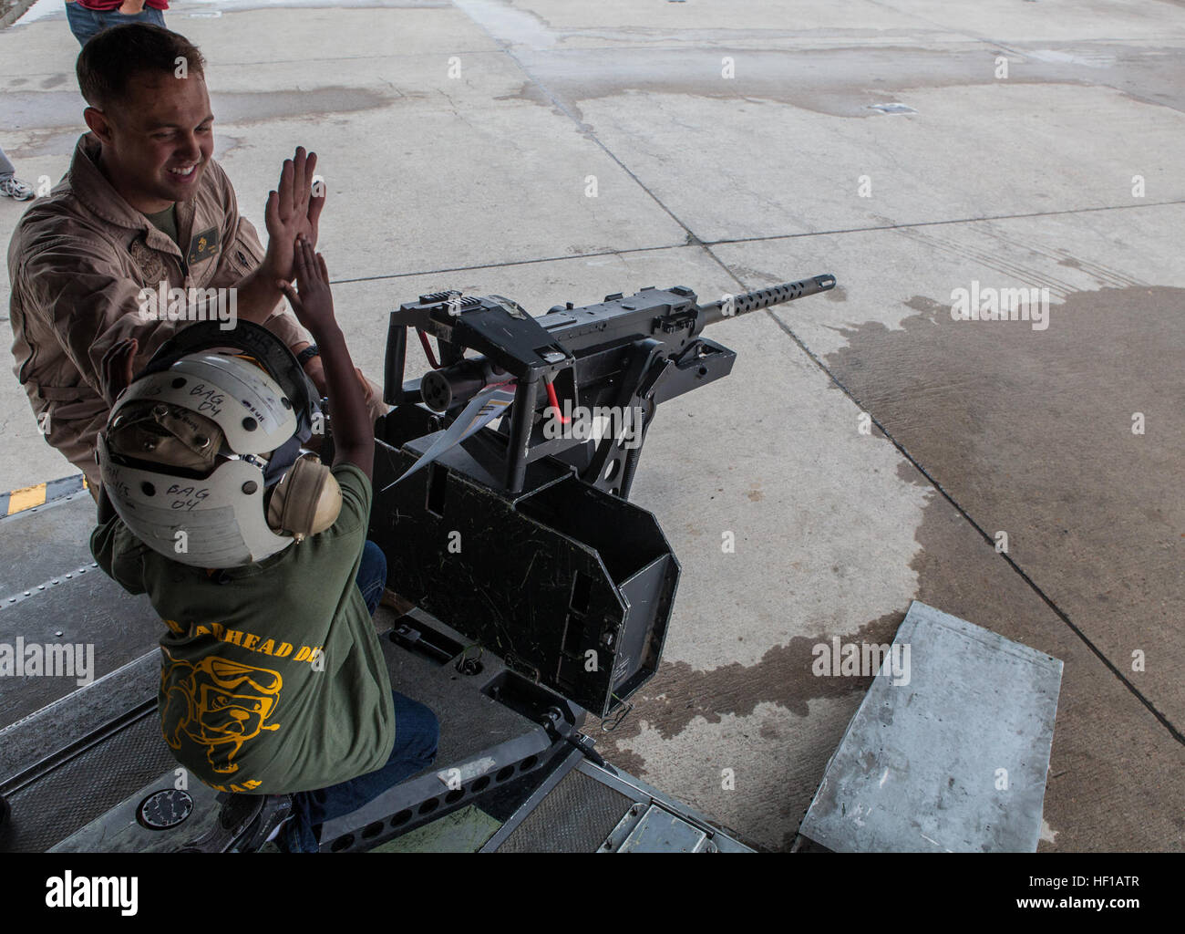 Cpl Scott Frank, a crew chief with Marine Heavy Helicopter 466 high ...
