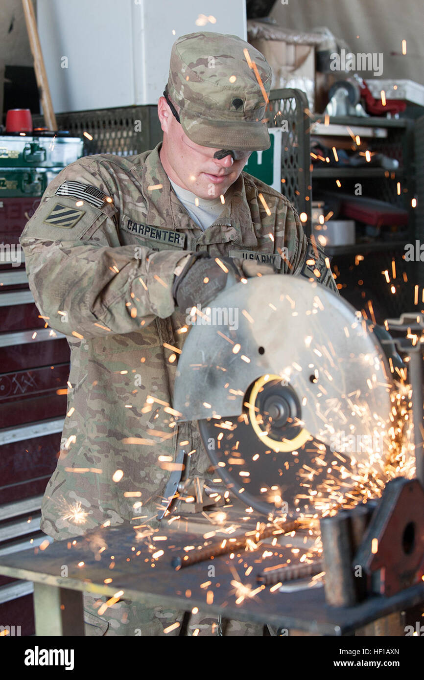U.S. Army Spc. Jonathan Carpenter, a wheeled vehicle mechanic with ...