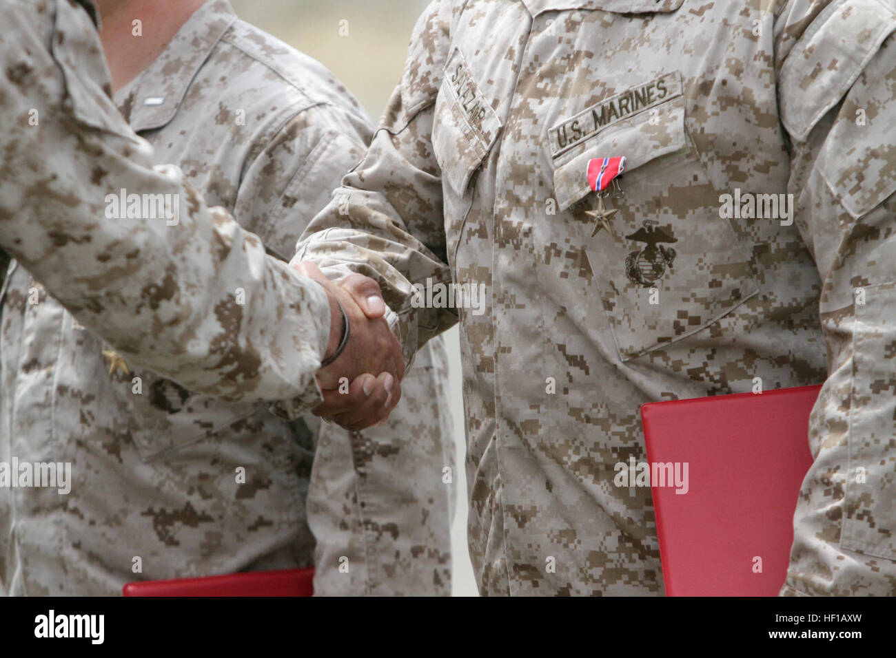 A Marine fire team leader is awarded the Bronze Star Medal with Combat ...