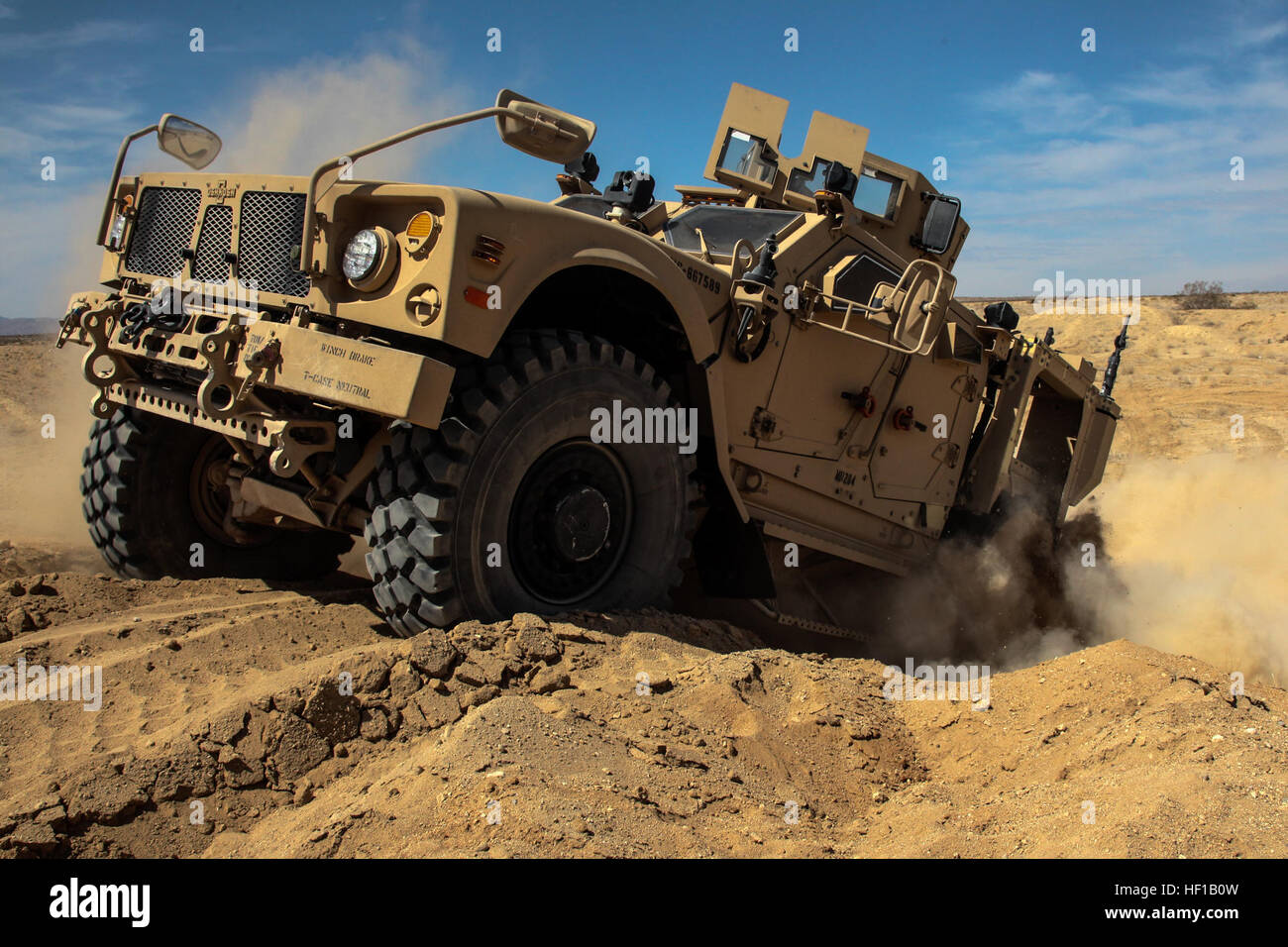A Mine Resistant, Ambush Protected (MRAP) vehicle is entrenched in the ...