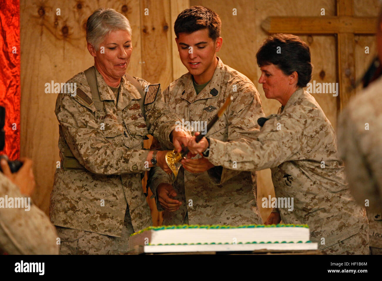 U.S. Navy Senior Chief Petty Officer Kathryn L. VanHooser, left, a ...