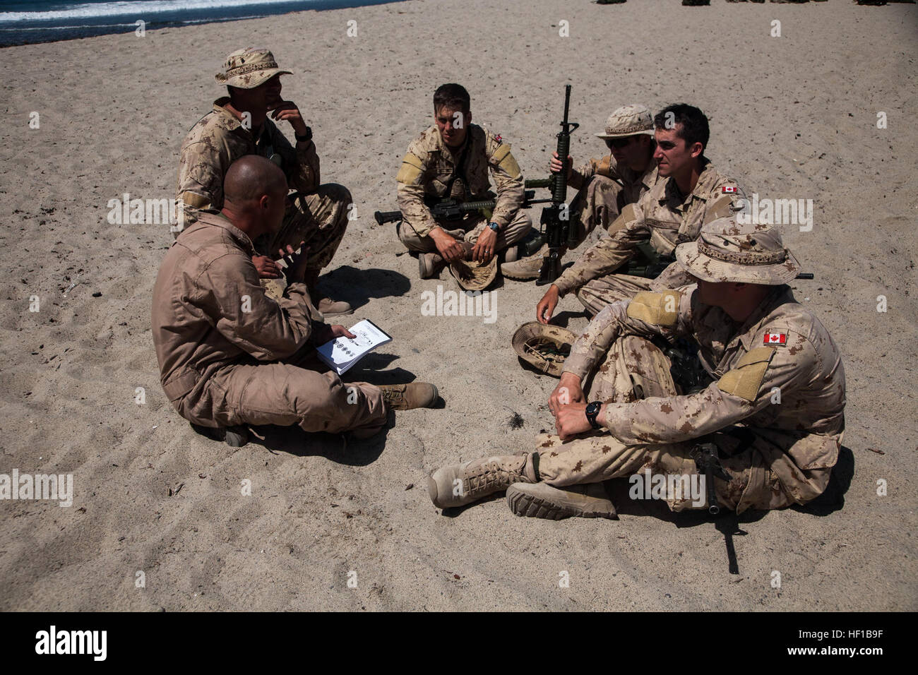U.S. Marine Corps Staff Sgt. Paul Osborn, left, with Delta company, 3rd ...