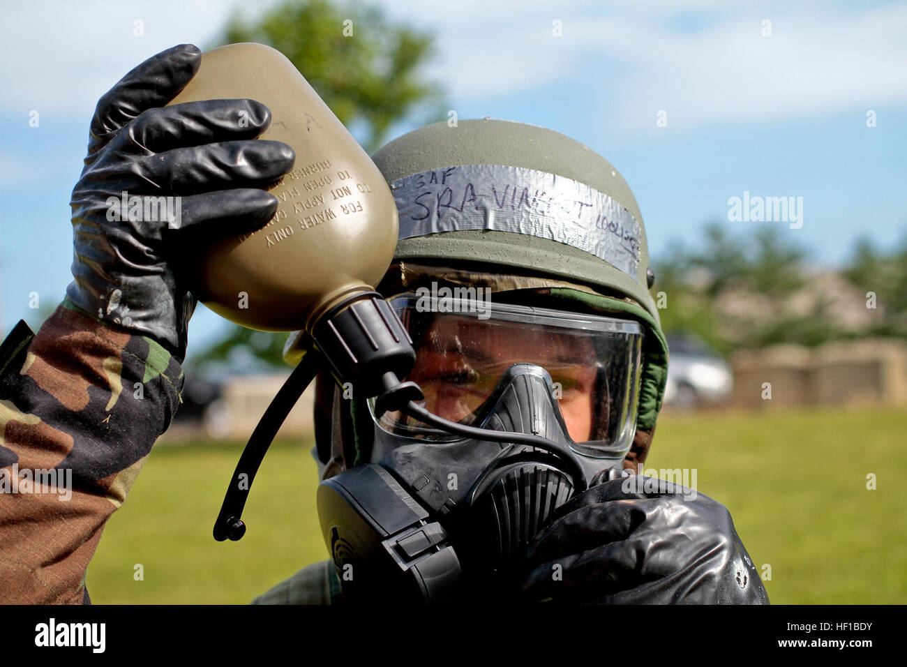 U.S. Air Force Senior Airman Vincent Loglisci hydrates while taking ...