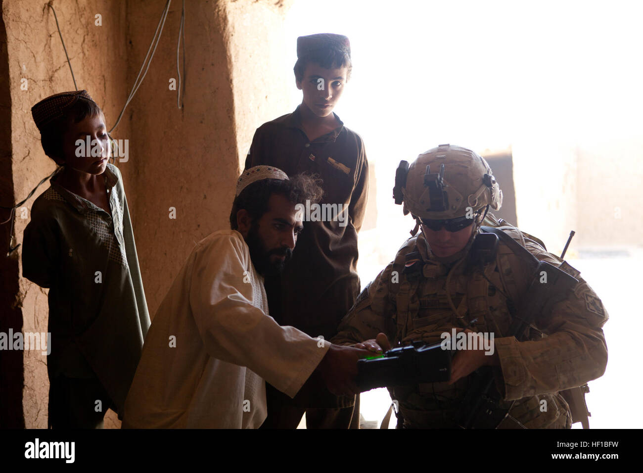 U.S. Army Staff Sgt. Michael Wilhoit, right, a combat engineer with the ...
