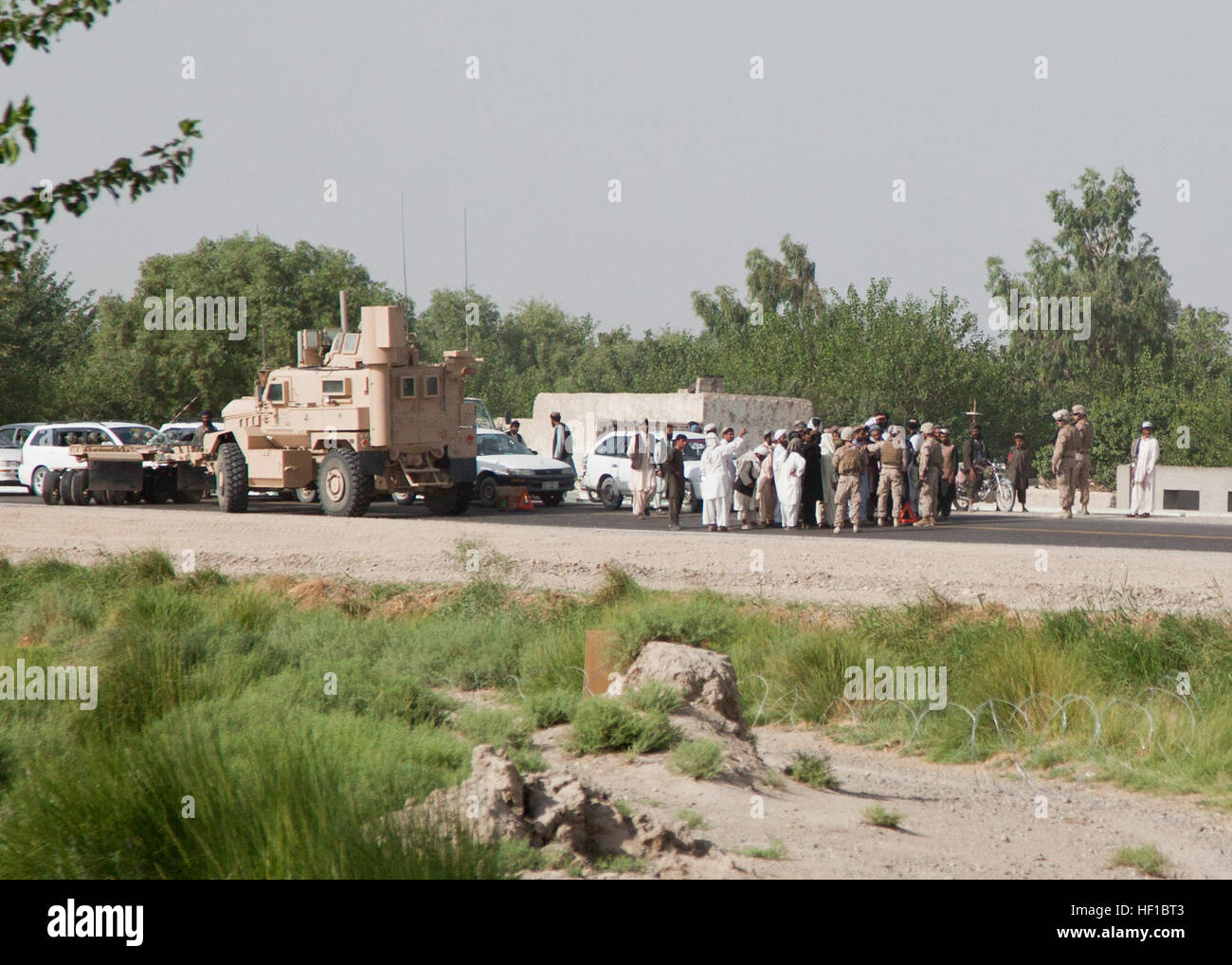 U.S. Marines with Engineer Company, Combat Logistics Regiment 2, speak ...