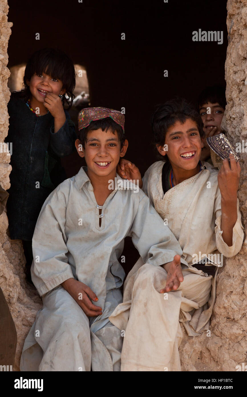 Afghan children pose for a photo in Habib Abad, Helmand province ...