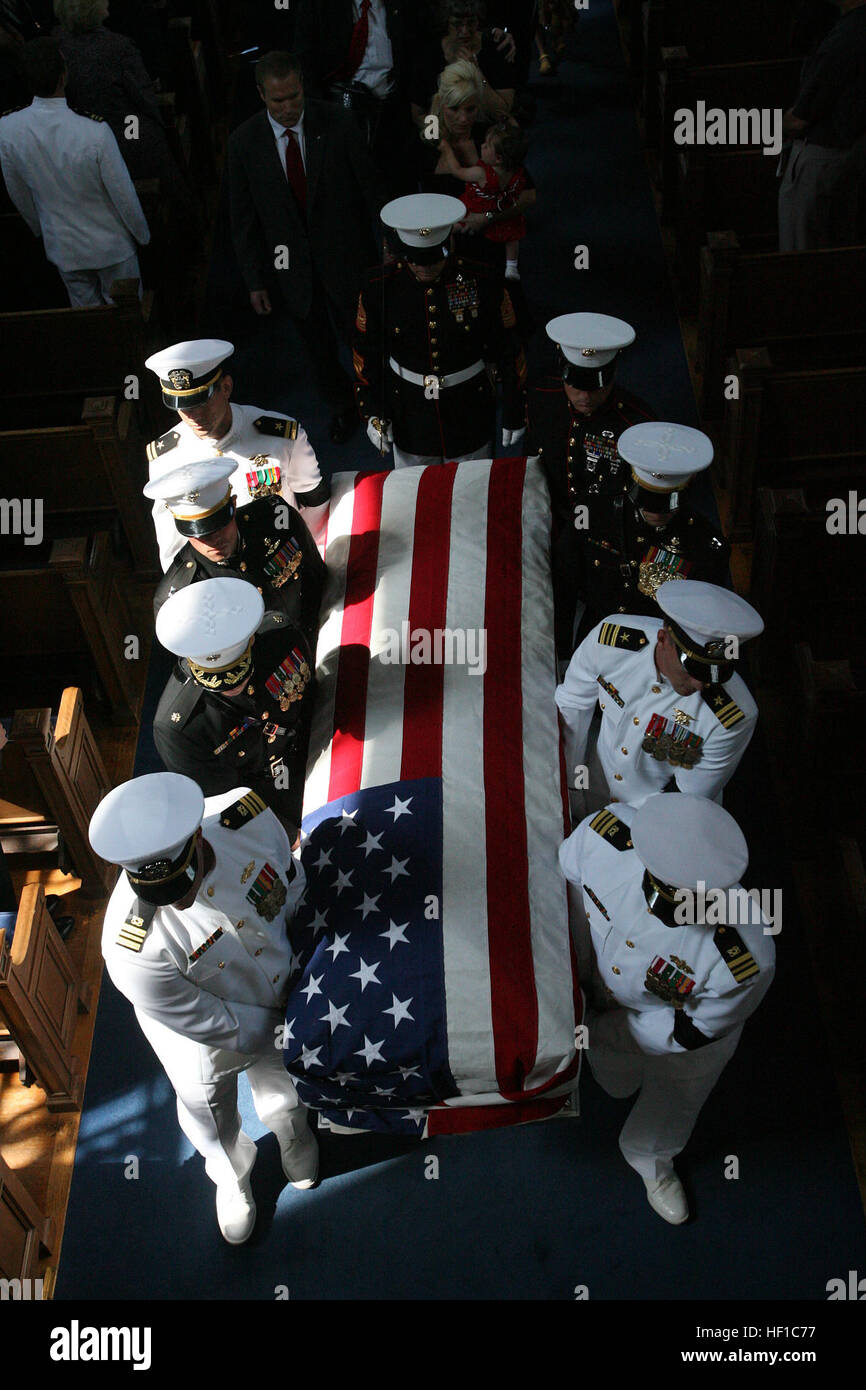 Marine and Navy officers carry Maj. Douglas A. Zembiec from the U.S ...