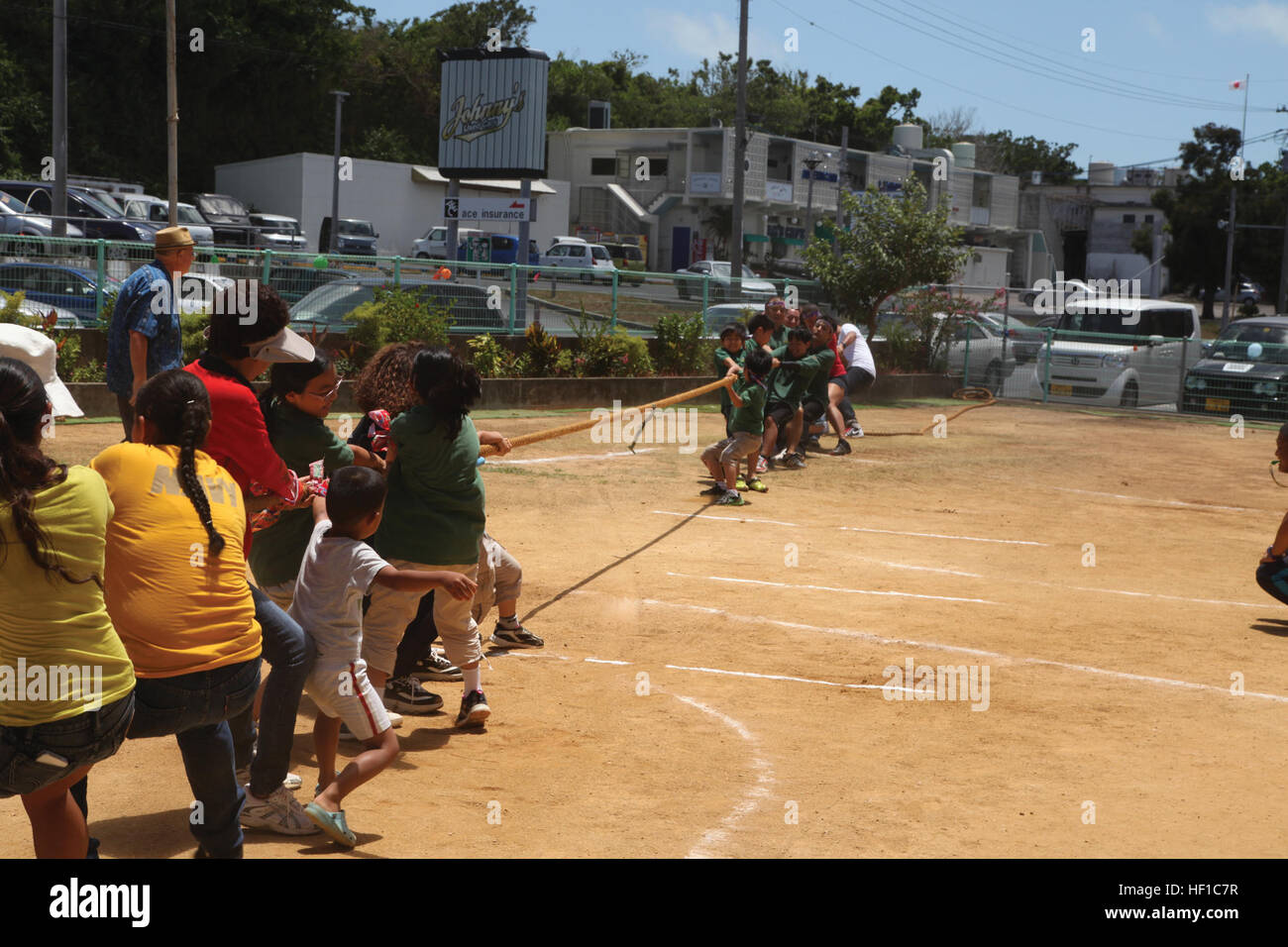 Two teams compete in a game of tug-of-war July 13 at the Busy Bee ...