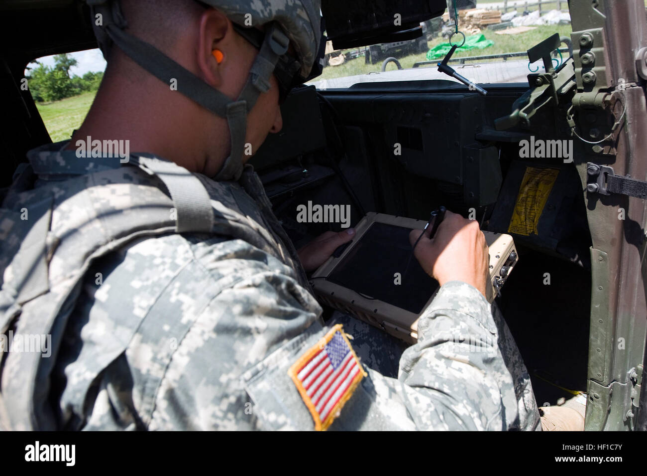 U.S. Army Sgt. Ryan Kluchurosky, gun sergeant with the Headquarters and ...