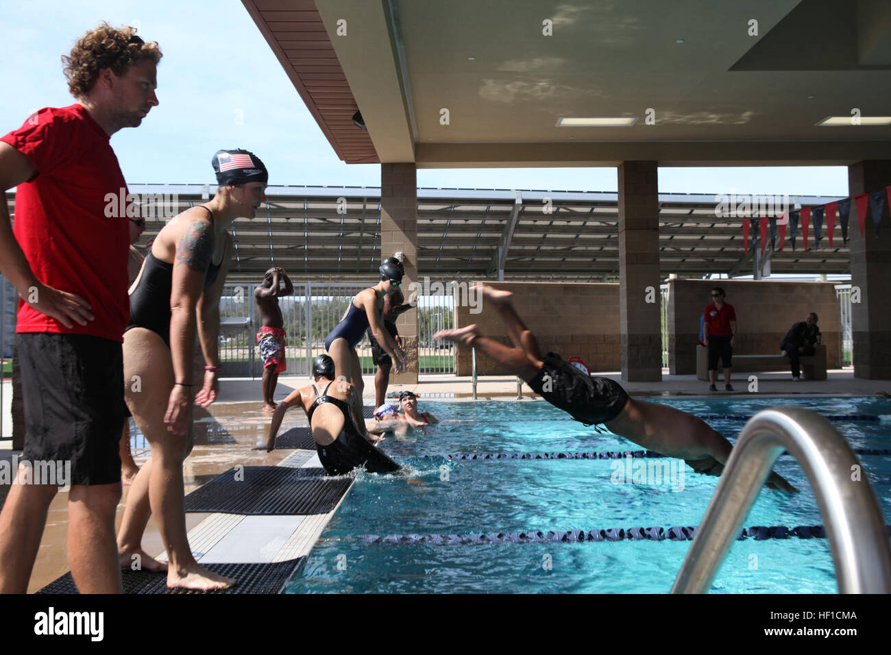 Coach Trevor Wallner works with Sgt. Rachel Brokaw from Wounded Warrior ...
