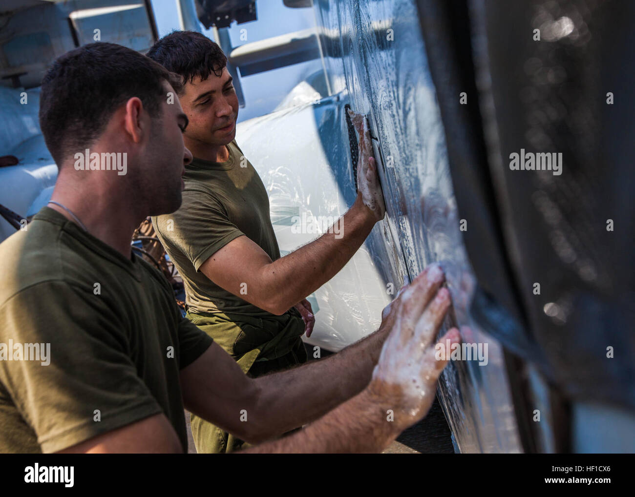 U.S. Marine Corps MV-22B Osprey crew chiefs and mechanics assigned to ...
