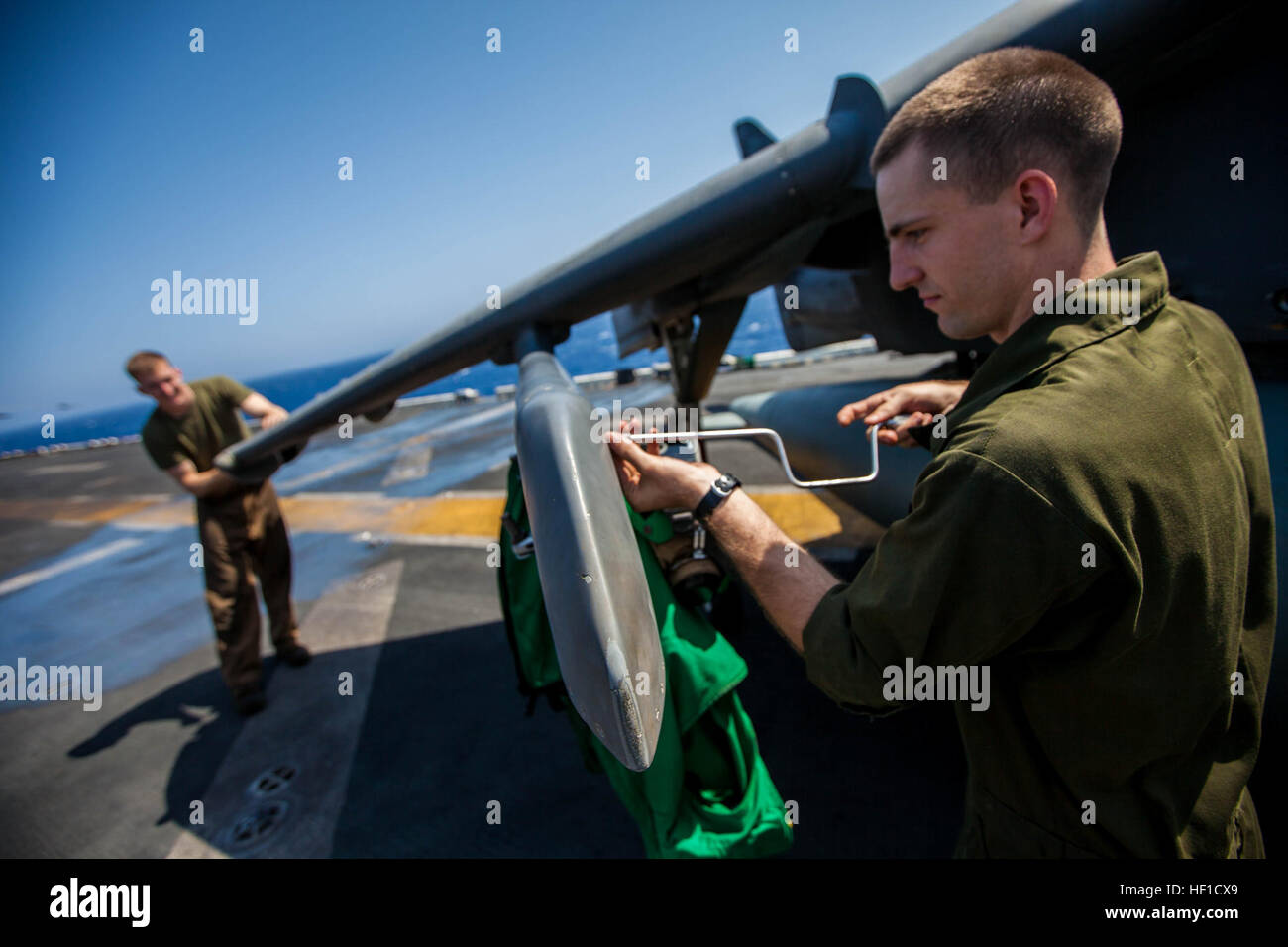U.S. Marine Corps Lance Cpl. Derek Dwire, an AV-8B Harrier airframe ...