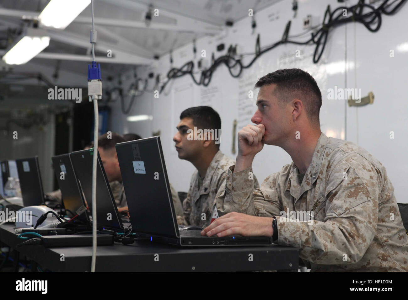 U.S. Marines assigned to Marine Air Control Group 48, look over radar ...