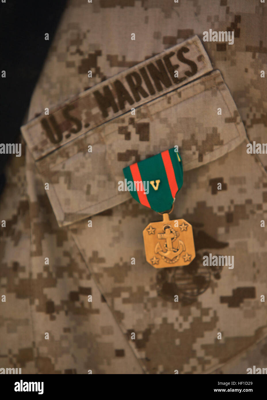 A Navy and Marine Corps Achievement Medal with Combat Distinguishing ...