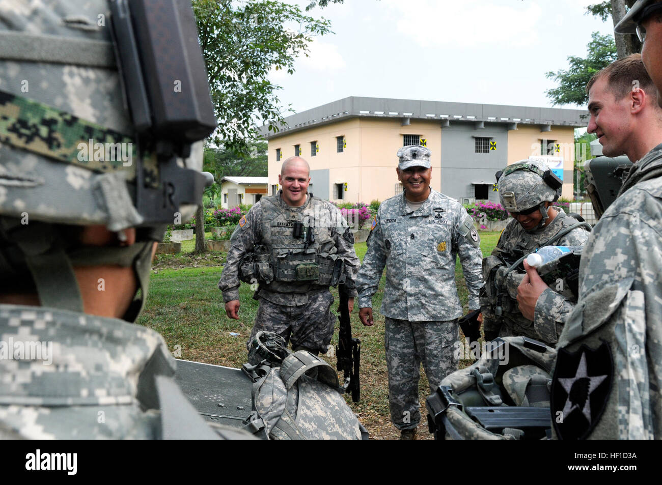 U.S. Army, Pacific's Command Sgt. Maj. Frank M. Leota (center) speaks ...