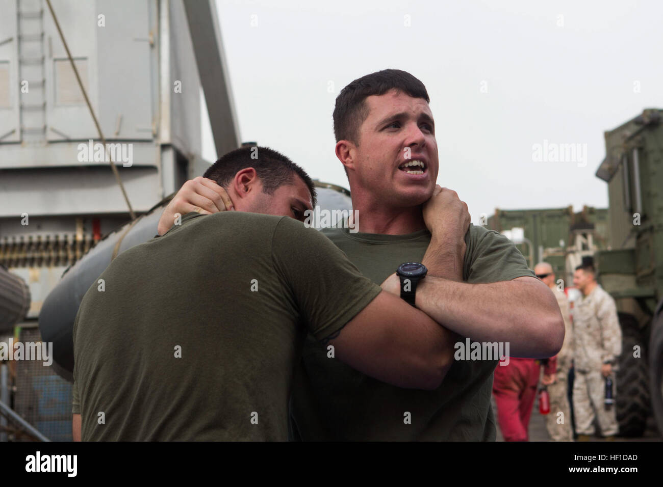 U.S. Marine Corps Sgt. Aaron Logan, right, tank commander and Marine ...
