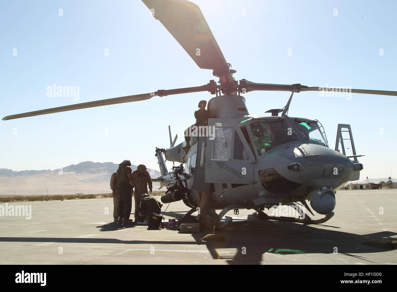 Marines with Marine Light Attack Helicopter Squadron 367 prepare their ...