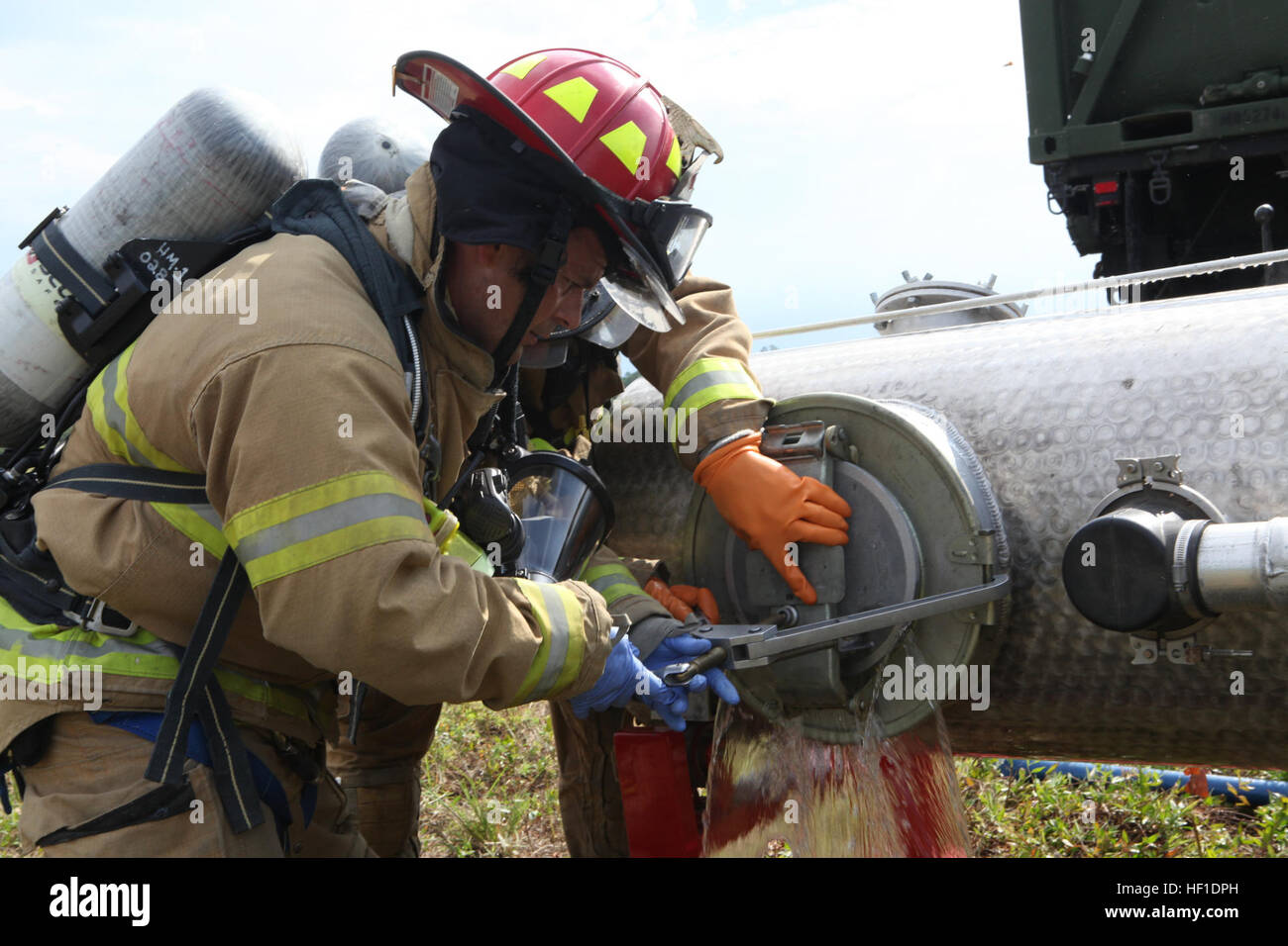 Firefighters from Cherry Point Fire and Emergency Services, attempt to ...