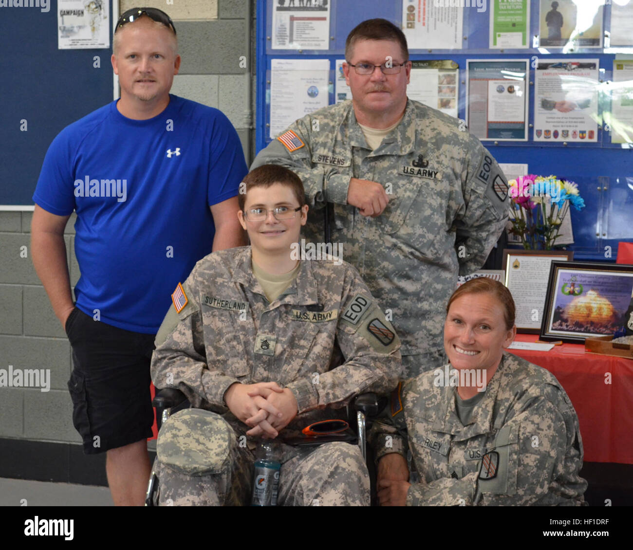 Army Staff Sgt. Ciara Riley, lower right, Devin Sutherland, lower left ...