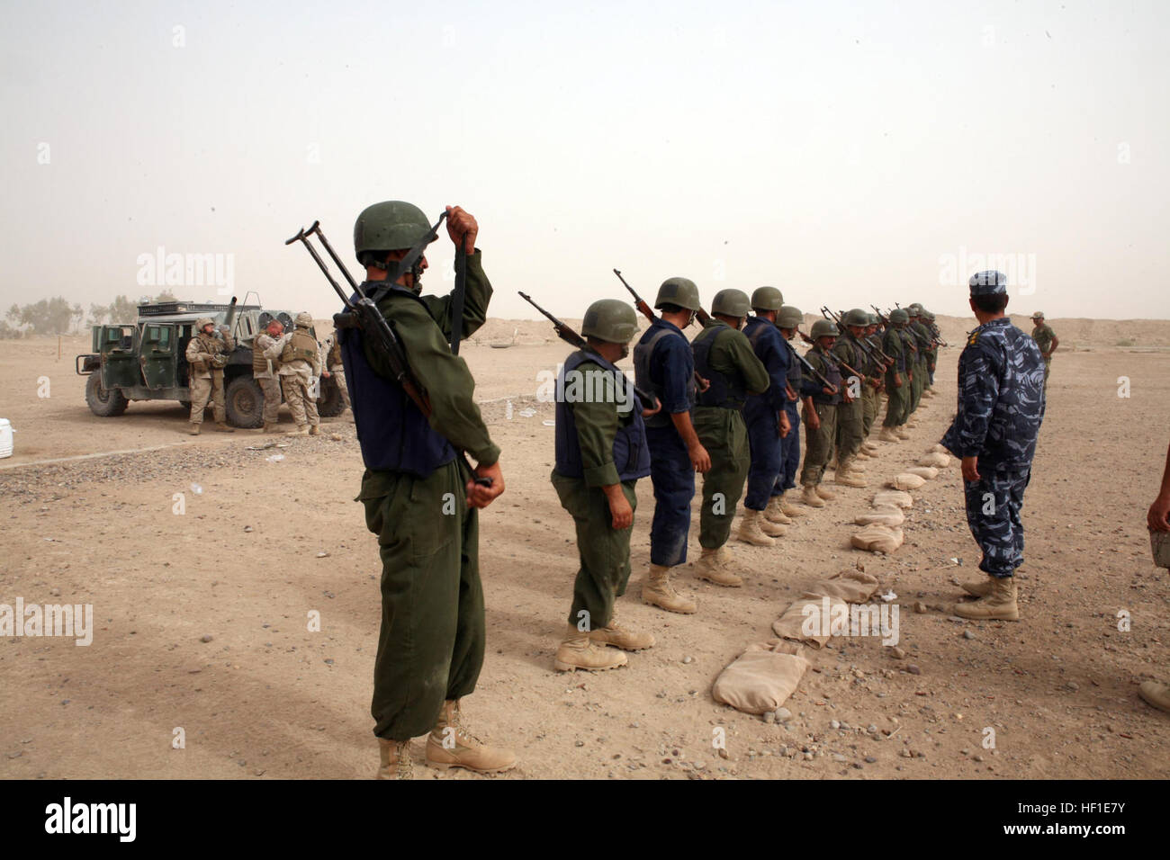 Personal Security Force recruits receive instruction before the next ...
