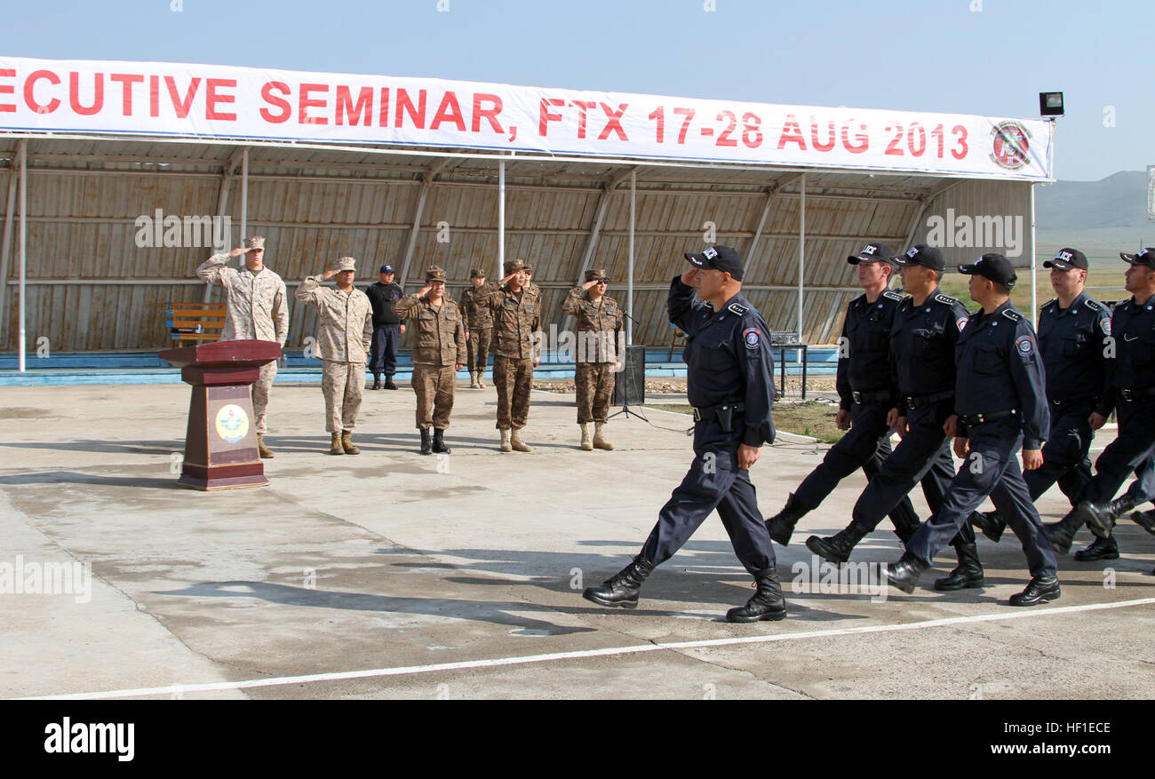 Mongolian General Police officers march during the pass and review ...
