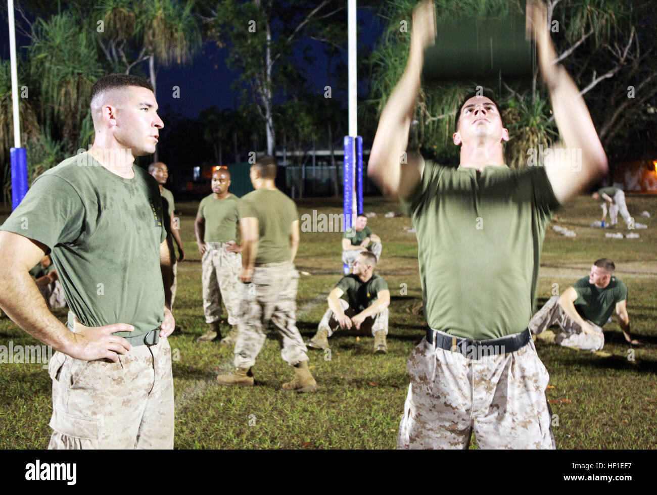 U.S. Marine Corps Staff Sgt. Daniel Hubbert, right, finishes the ...