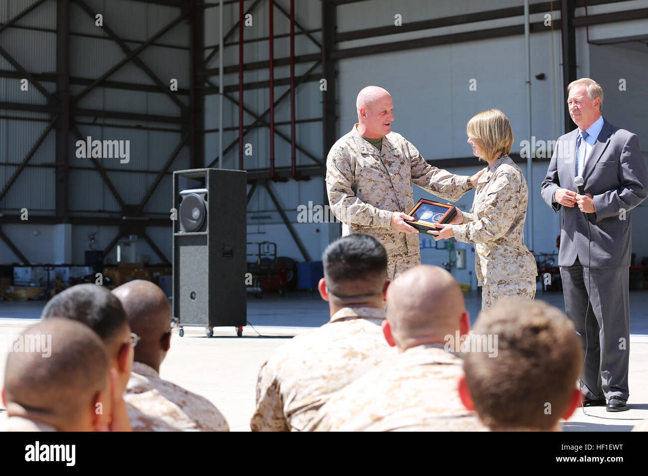 Maj. Gen. Steven Busby, 3rd Marine Aircraft Wing, passes a ...