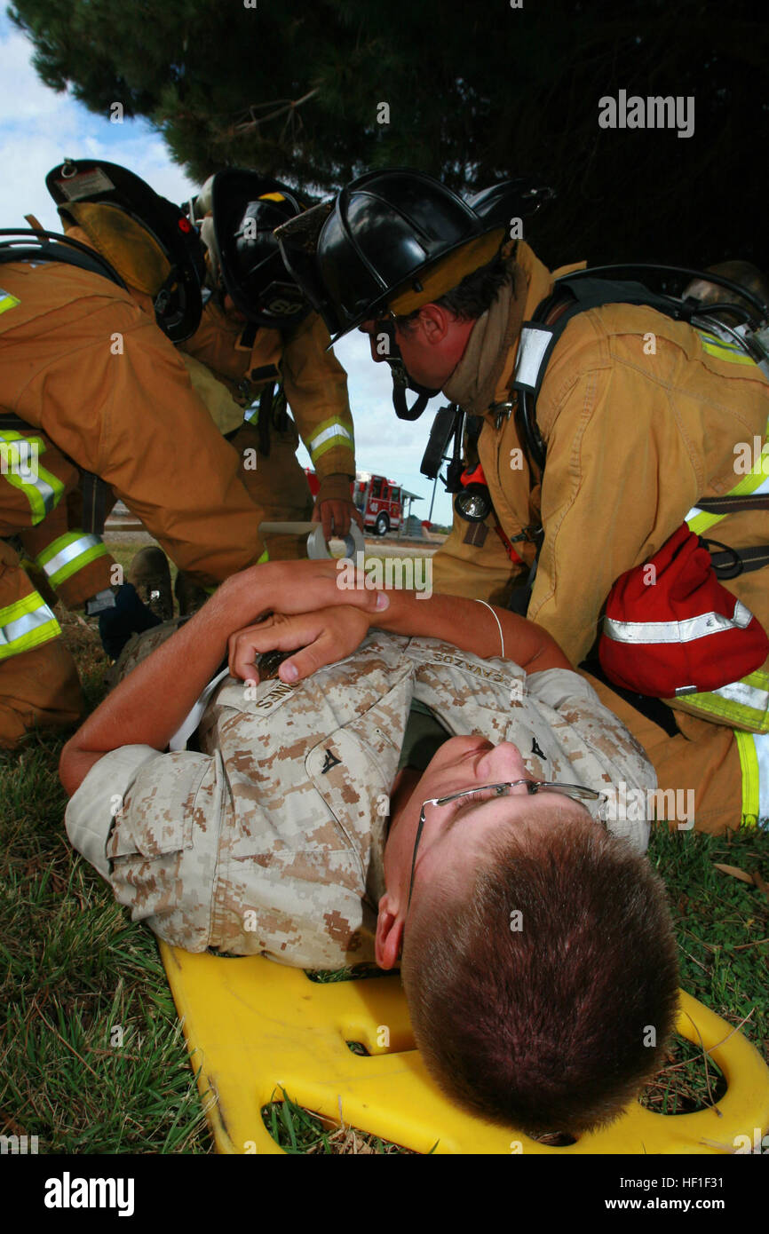 Firefighters with the Marine Corps Air Station Miramar Fire Department ...