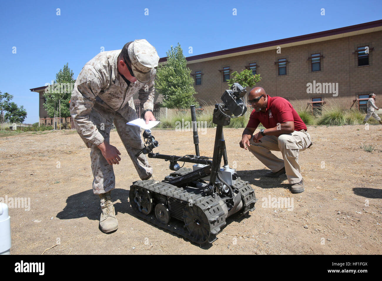 Craig Burnett, right, a civilian technician and trainer with Robotic ...