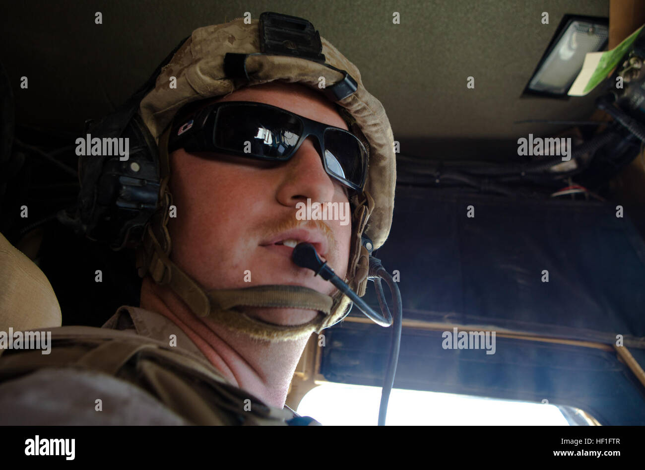 A motor vehicle operator with Combat Logistics Regiment 2 drives the ...