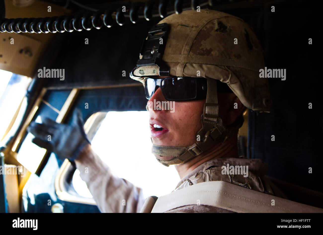 A Marine navigator with Combat Logistics Regiment 2 guides a convoy ...