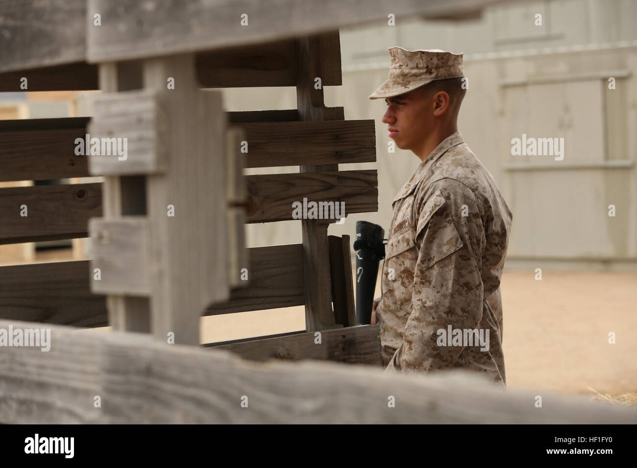 U.S. Marine Lance Cpl. Raymond Perry with Chemical Biological ...