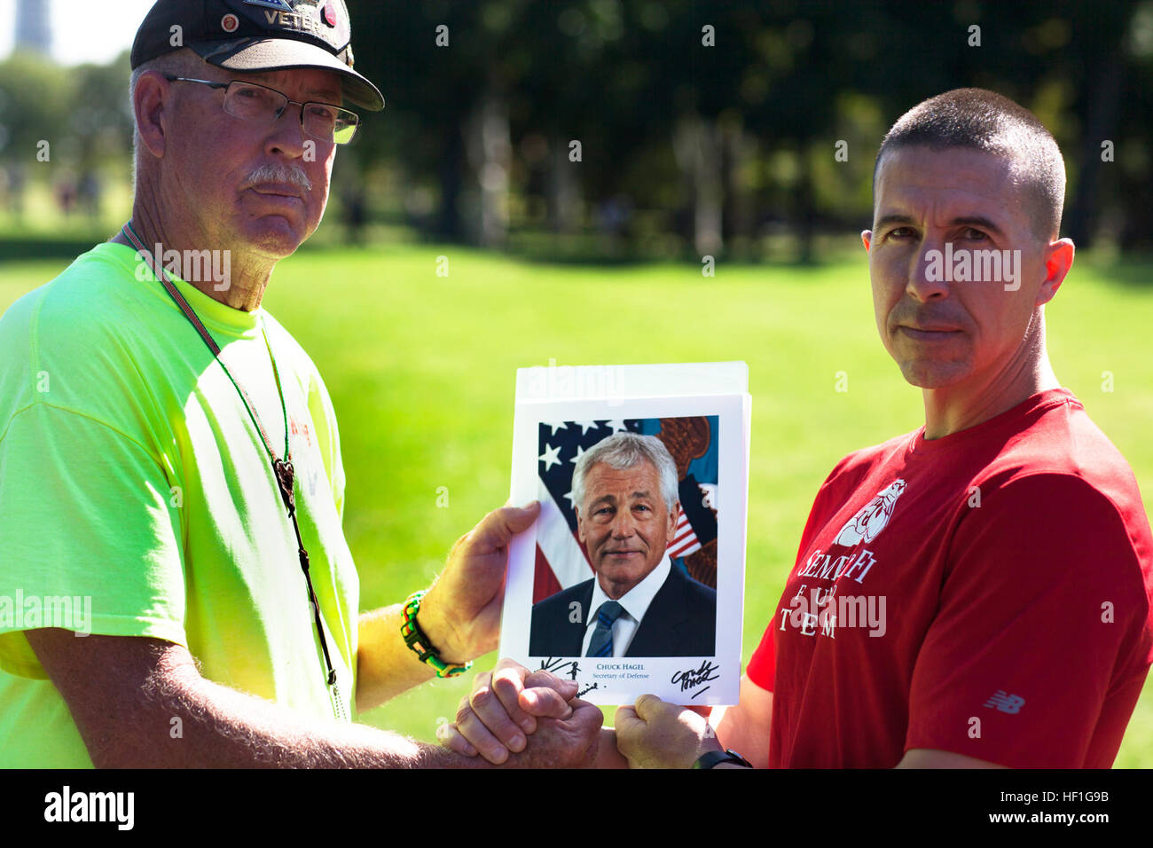 Col. Ben Watson presents Marine Veteran Sgt. Chuck Lewis with a ...