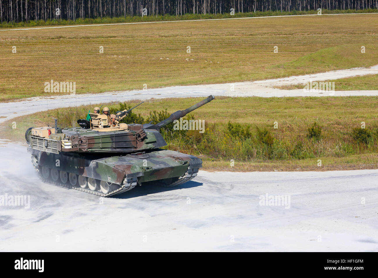 Marines with 2nd tank Battalion, 2nd Marine Division, keep the barrel ...