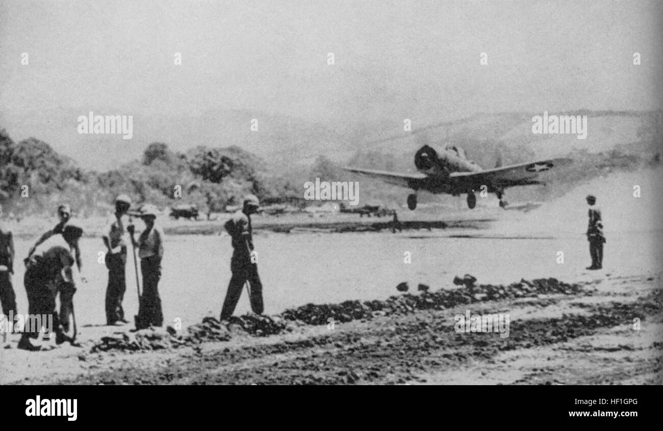 A ground crew watches a plane take off for a raid on Matanikau Stock ...
