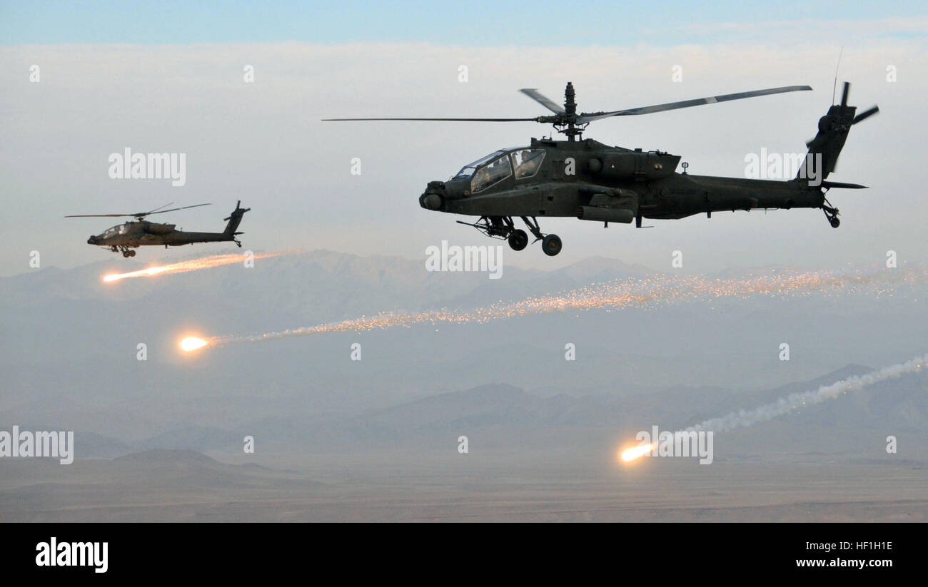 Two AH-64D Apache Longbows from Task Force Comanche, 4th Combat ...