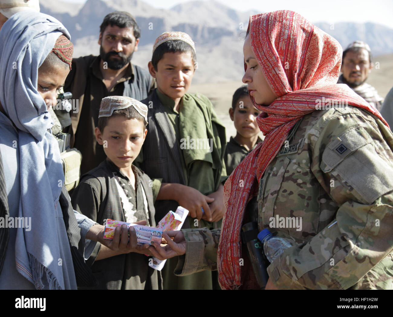 US Army Staff Sgt. Silvanna Smith gives toothbrushes and toothpaste to ...