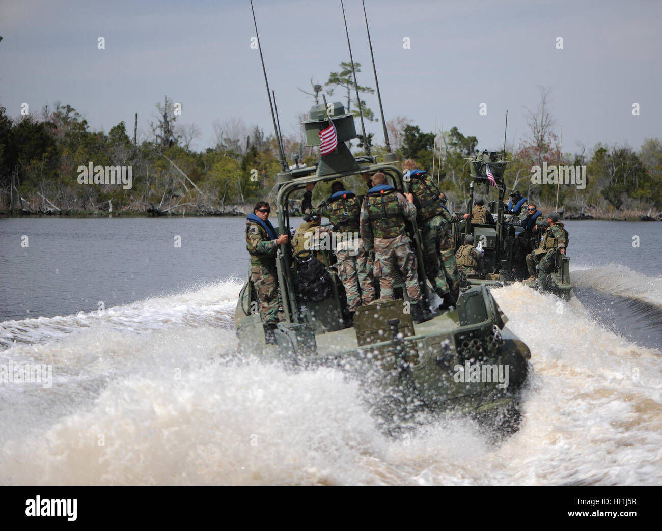 Sailors with Riverine Squadron 3 train Marines from the Royal ...