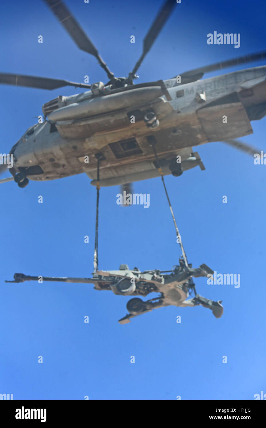A CH-53E Super Stallion from HMH-464, MAG-29, 2nd MAW transports an ...